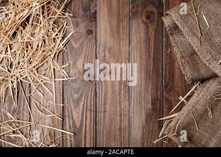 Wooden floor background and dry straw Stock Photo - Alamy