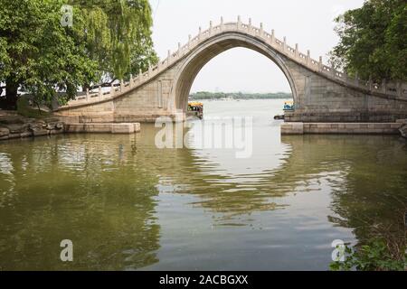 A moon bridge is a highly-rounded arched pedestrian bridge associated ...
