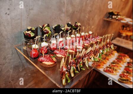 Delicious snacks on wedding reception table in luxury outdoor ...