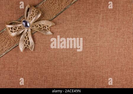 Burlap bow with gold glitter on white background, Christmas holiday ...