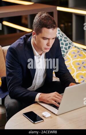 People sitting in a lounge zone among bouquets of flowers. April 17 ...