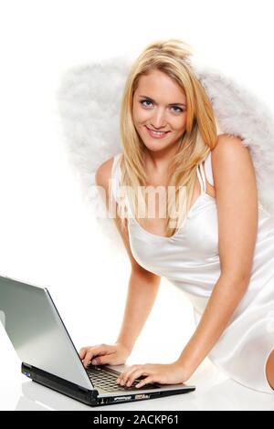 Christmas Angel with Laptop Stock Photo - Alamy