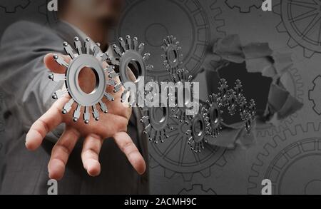 hand shows people cogs as concept Stock Photo - Alamy