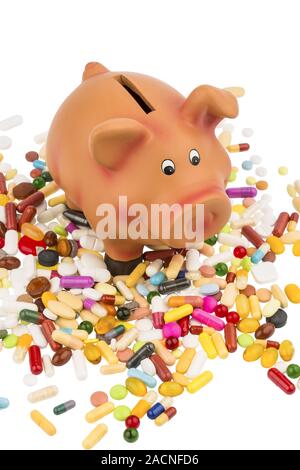 Tablets and piggy banks Stock Photo - Alamy