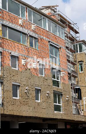 Thermal insulation for new shell of residential building Stock Photo ...