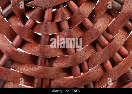 Wicker texture, close-up fragment of a basket made of willow branches ...