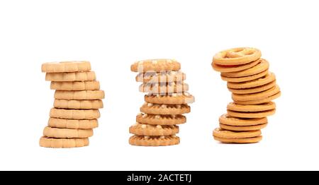 Three stacks of different biscuits. White background Stock Photo - Alamy