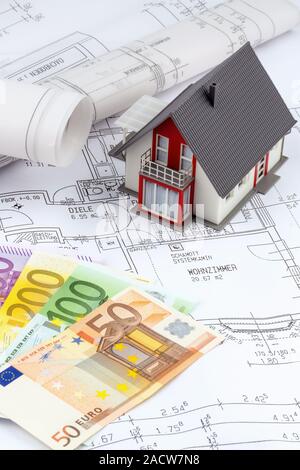 House plan with Euro banknotes Stock Photo - Alamy