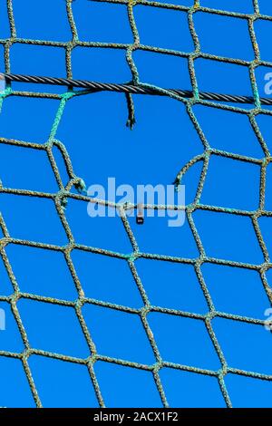hole in a net Stock Photo - Alamy