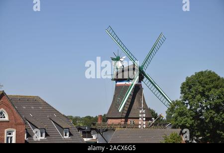 Windmill on northern beach Stock Photo - Alamy