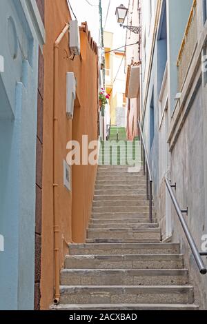 Alley with staircase in the village of La Motte-Chalancon, Drôme ...