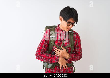 Chinese hiker man wearing backpack canteen glasses over isolated white ...
