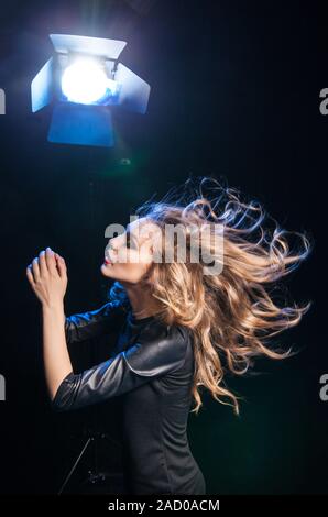 Woman portrait, blonde or windy hairstyle on studio background for ...
