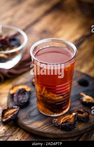 Prune drink, dried plums extract, fruits beverage Stock Photo - Alamy