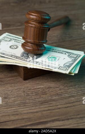Photo of hammer with dollars Stock Photo - Alamy