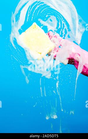 Person washes window with sponge Stock Photo - Alamy
