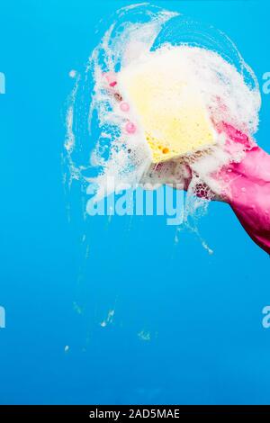 Man washes window with sponge Stock Photo - Alamy