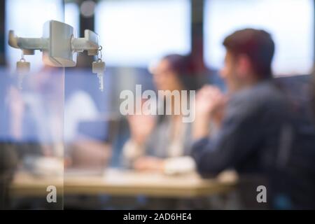 Modern Glass Door with Handle, Keys and Security Panel Stock Photo - Alamy