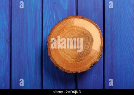 Oak cracked split on navy blue wooden table overhead view Stock Photo ...