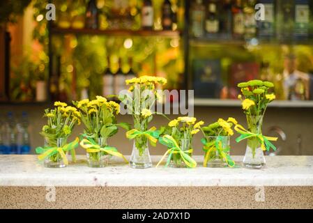 Summer flower composition with yellow flowers, wedding decoration Stock ...
