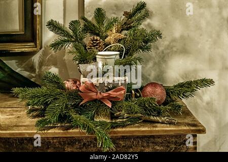 Green branches of a Christmas tree with LED light bulbs, garland and ...