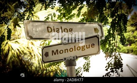 Street Sign to Dialog versus Monologue Stock Photo - Alamy