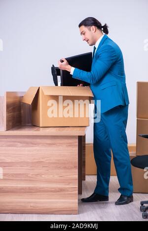 Young handsome businessman being fired from his work Stock Photo - Alamy