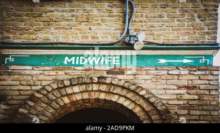 Street Sign the Direction Way to Midwife Stock Photo - Alamy