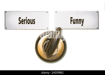 Street Sign Funny versus Serious Stock Photo - Alamy
