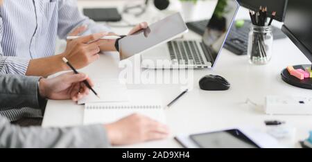 Cropped shot of professional architect and engineer working together on ...