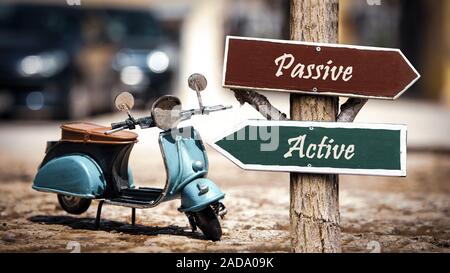 Street Sign to Active versus Passive Stock Photo - Alamy