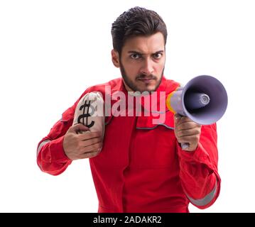 Young repairman with a megaphone and a money bag isolated on whi Stock ...