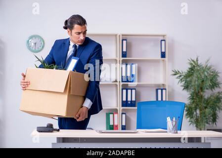 Young employee being made redundant Stock Photo - Alamy