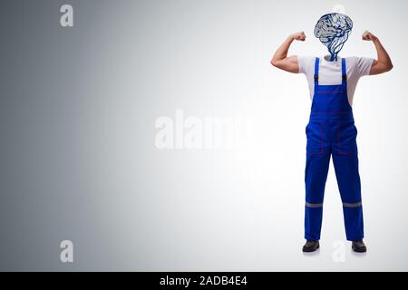 The worker with brain in robotics and automation concept Stock Photo ...