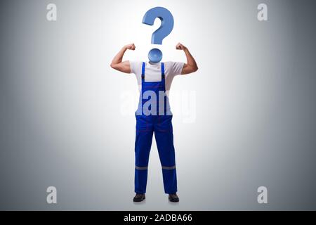 The worker with question mark instead of head Stock Photo - Alamy