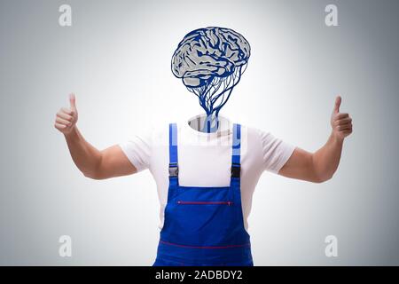 The worker with brain in robotics and automation concept Stock Photo ...