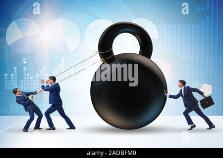 Businessmen trying to deal with difficult task Stock Photo - Alamy