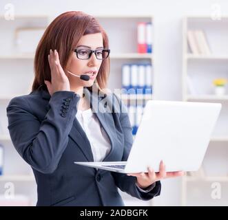 Call center operator working with clients Stock Photo - Alamy