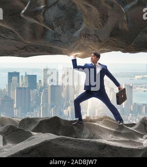 Businessman supporting stone under pressure Stock Photo - Alamy