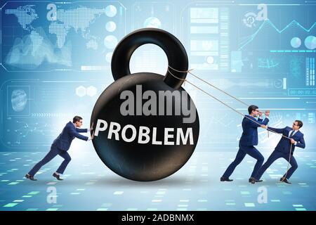 Businessmen trying to deal with difficult problem Stock Photo - Alamy