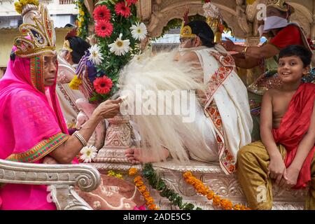 A procession of the Jain community in Mumbai, India, with a prominent ...
