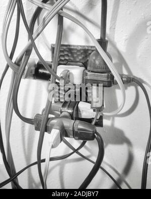 house electrical fire overloaded extension power plug lead Stock Photo ...