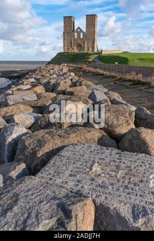 Reculver Towers Kent from the beach on a red dawn glowing morning Stock ...