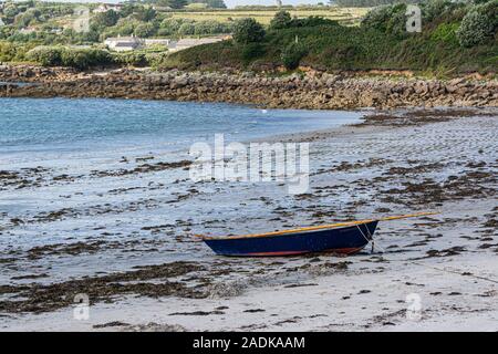 A blue wooden boat on Porthmellon beach, St Mary's, Isles of Scilly ...