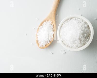 Sea salt crystals - Gray background. Top view Stock Photo - Alamy