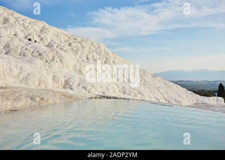 Travertines in Turkey. Calcite cliff of Pamukkale Stock Photo - Alamy