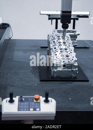 CMM Coordinate Measuring Machine probe measuring workpiece in ...