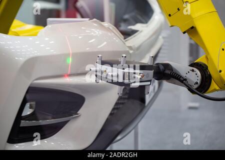 Automated robotic arm CMM scanning in automotive industry Stock Photo ...