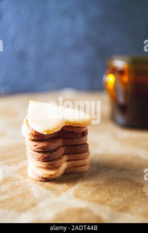 Heart shaped wooden dish with blue sweet meringues and macaroons Stock ...