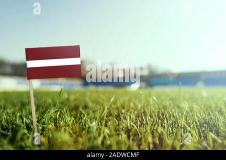 Small national flag of the Latvia on a black background Stock Photo - Alamy